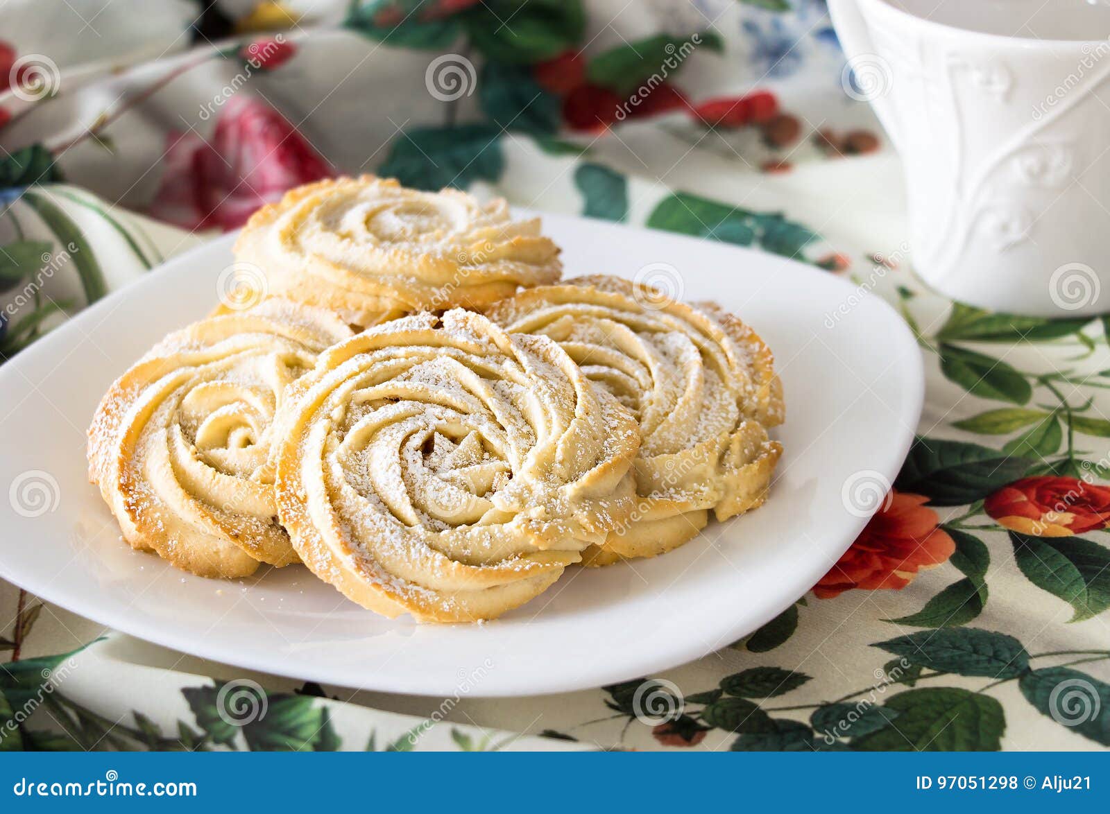 Round Shortbread Cookies in the Form of Roses. White Plate Stock Photo ...