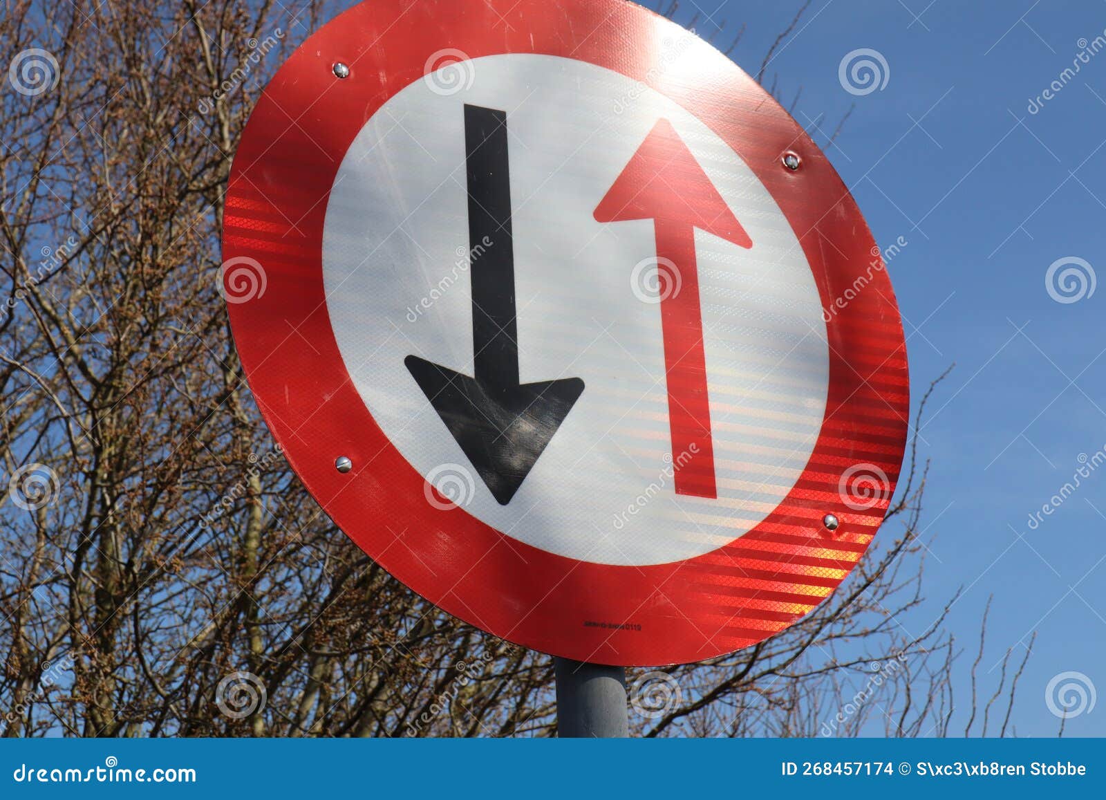 Round Sign with Black and Red Arrow Stock Photo - Image of armor, stop ...