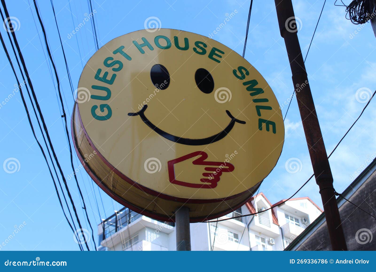 Round Smiling Smiley with a Pointer Where the Hotel is Located Stock ...