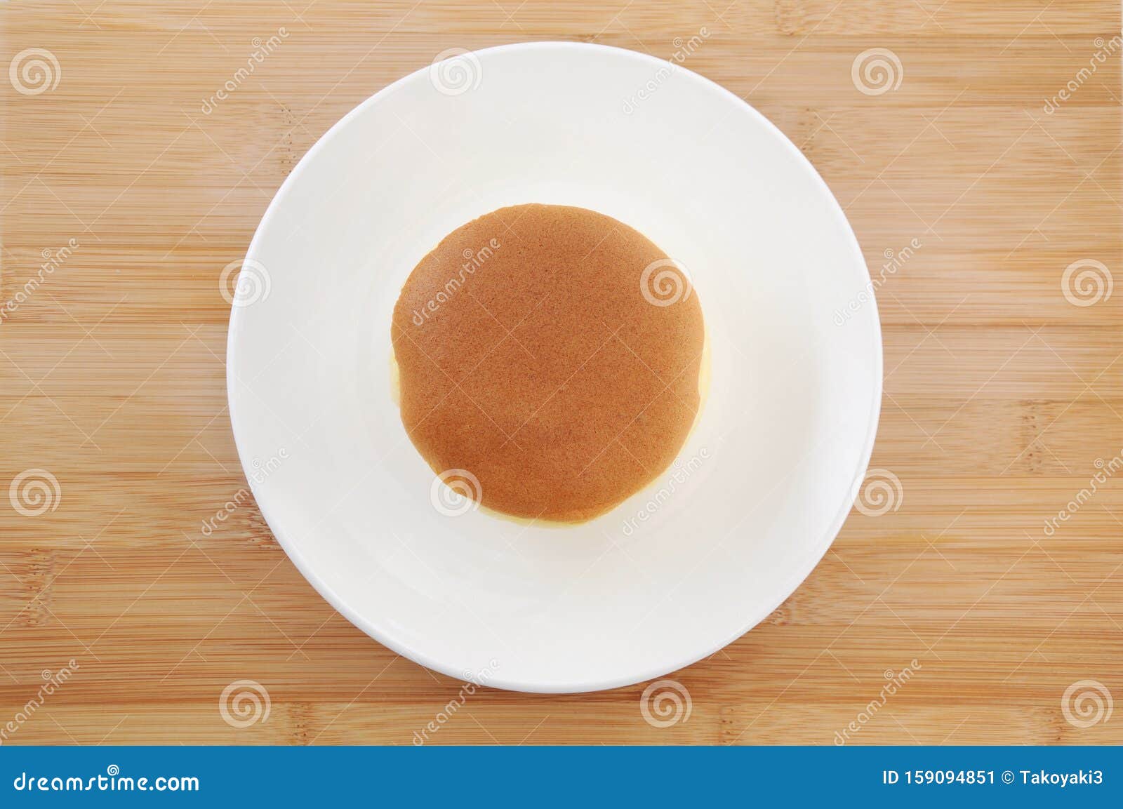 Round Sponge Cake on Plate on Table Stock Image - Image of cutting ...