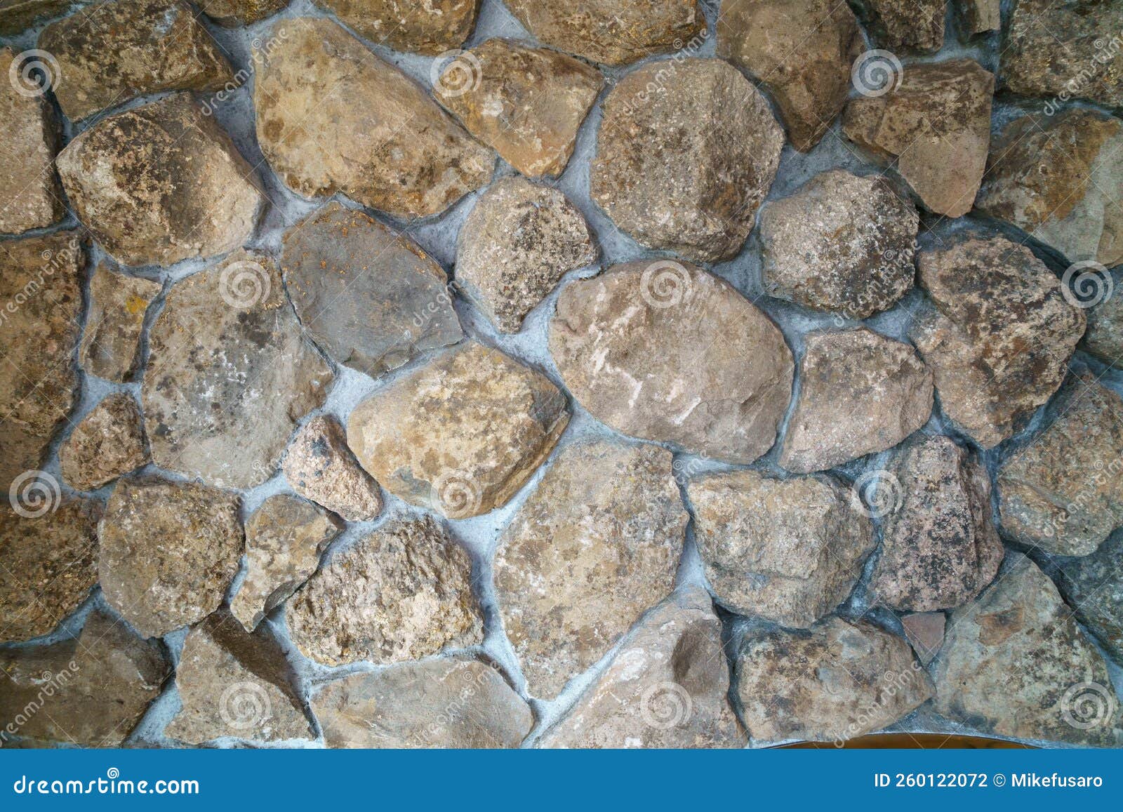 Round stone wall stock photo. Image of rough, texture - 260122072