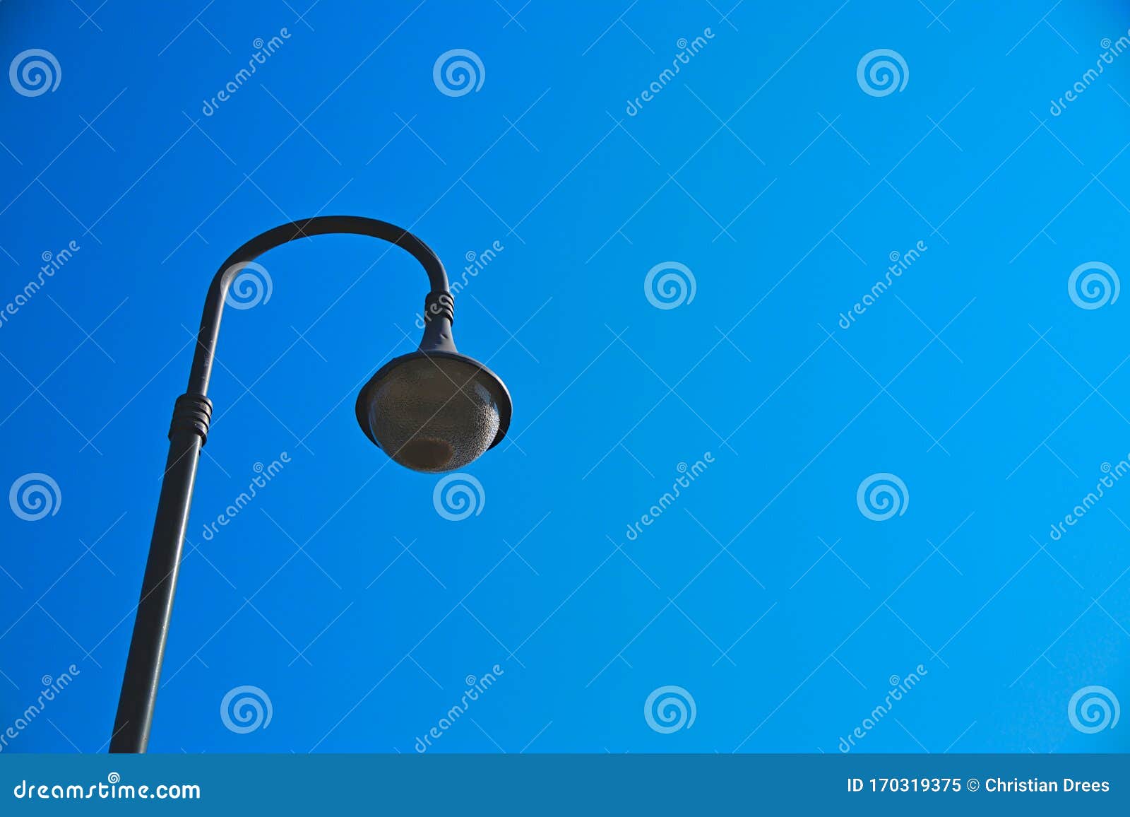 Round Street Lamp on the Left on Blue Sky Stock Image - Image of lamp ...
