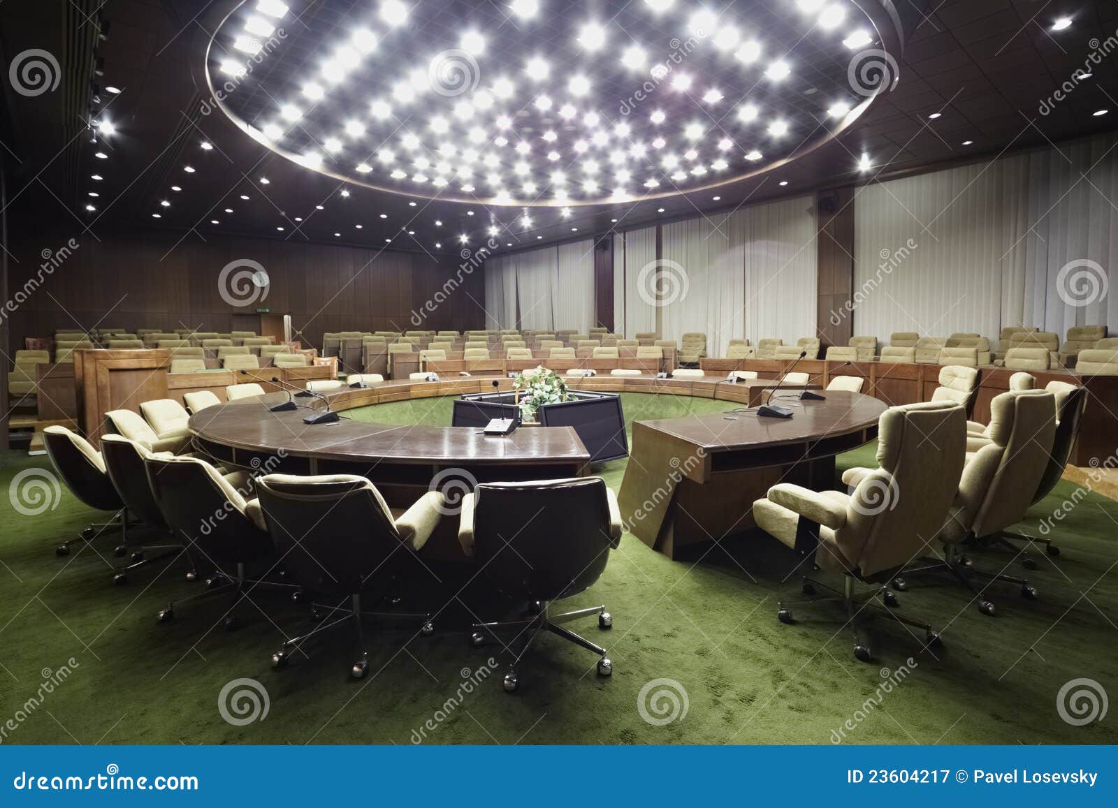 Round table in auditorium. stock image. Image of floor - 23604217