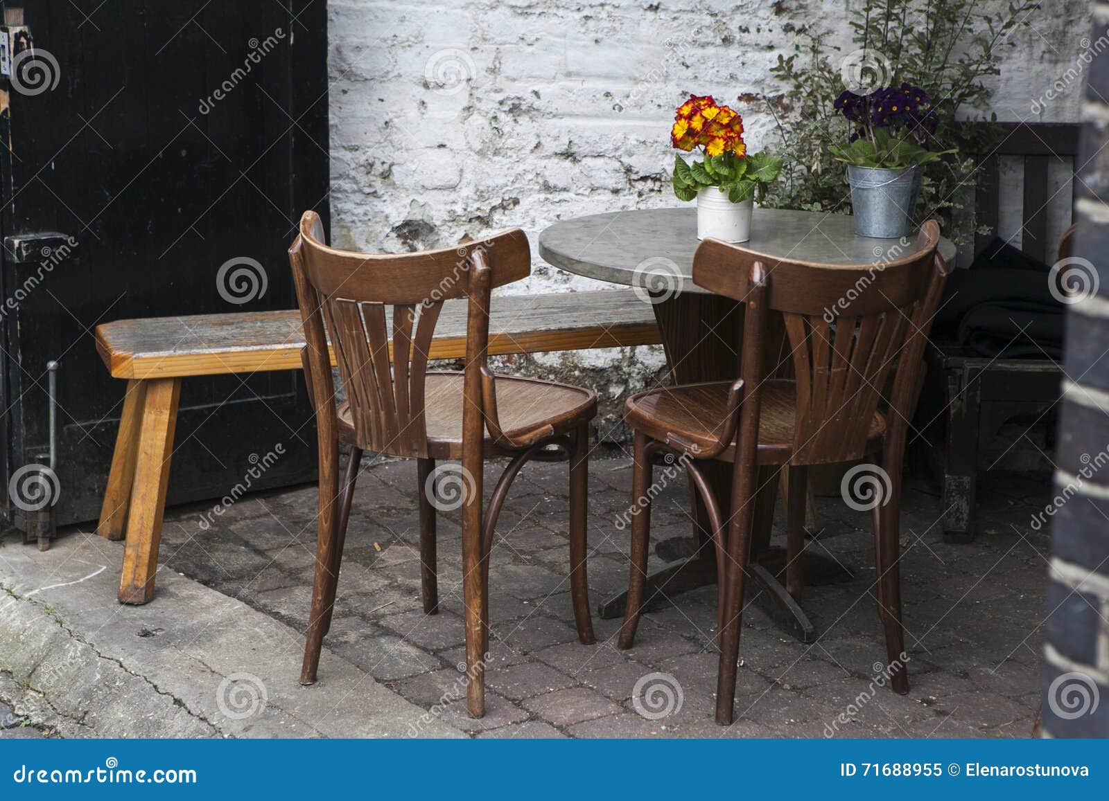 Round table and two chairs stock image. Image of comfortable - 71688955