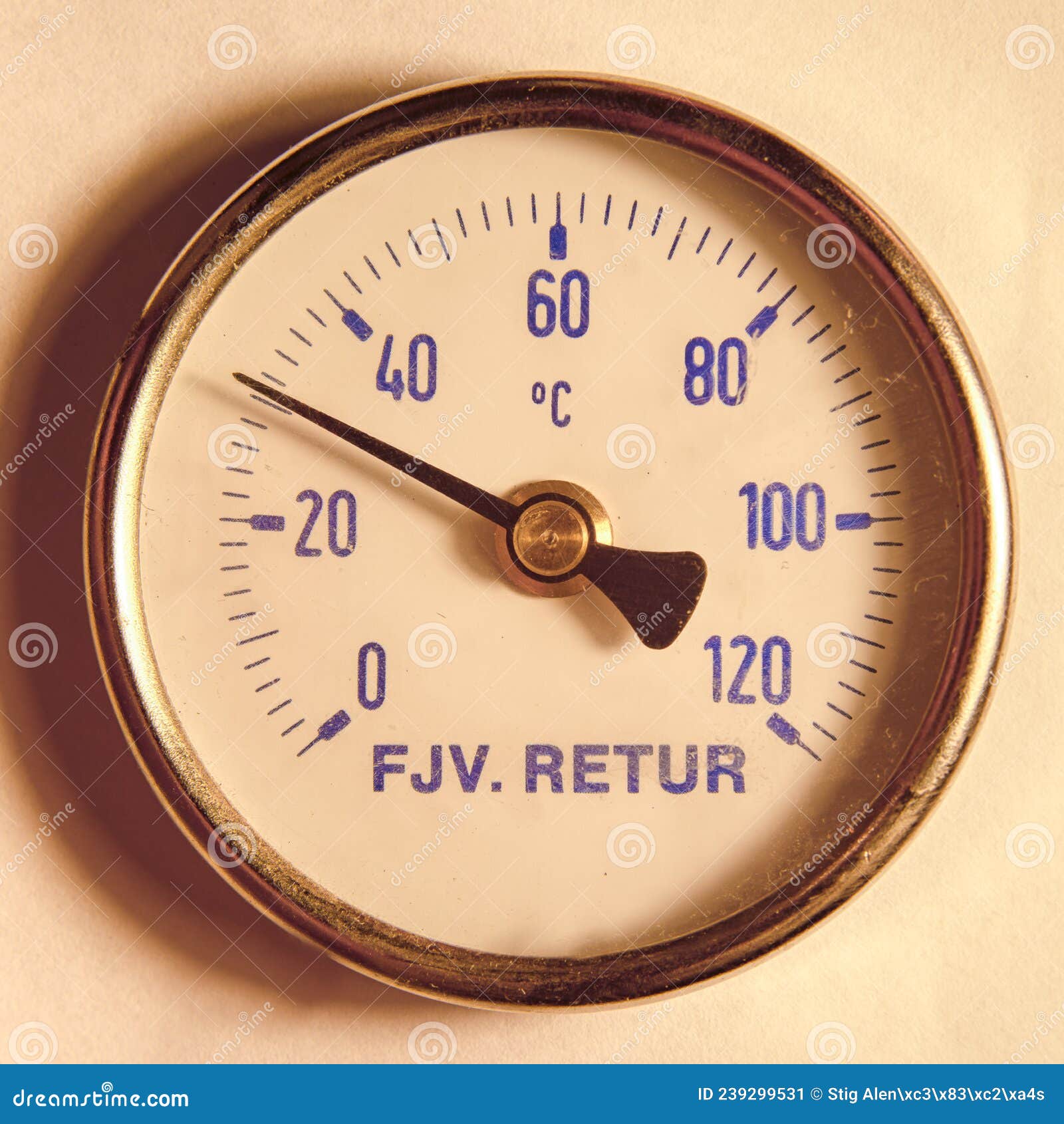 A Round Temperature Meter on the Returning Water To a District Heating ...