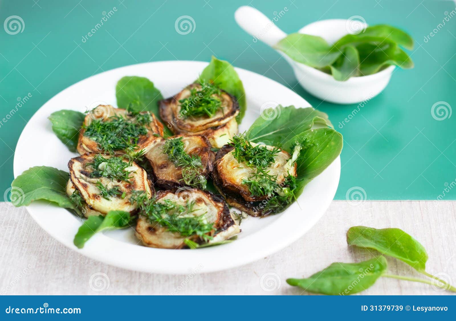 Round Vegetable Marrow with Dill and Garlic on the Green Background ...