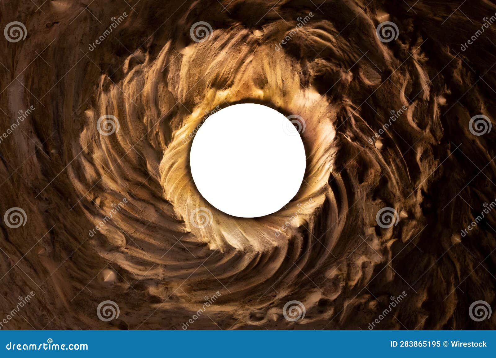 A Circular White Light is Shown in the Middle of a Textured Surface ...