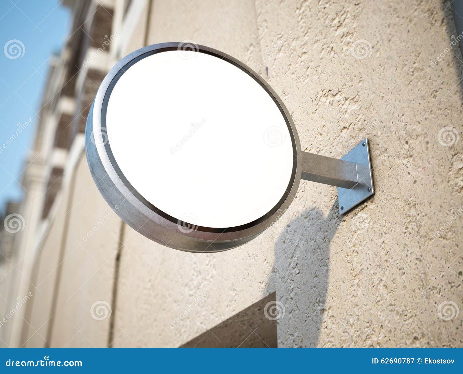 Round White Signboard on the Building with Beige Wall. Stock Image ...