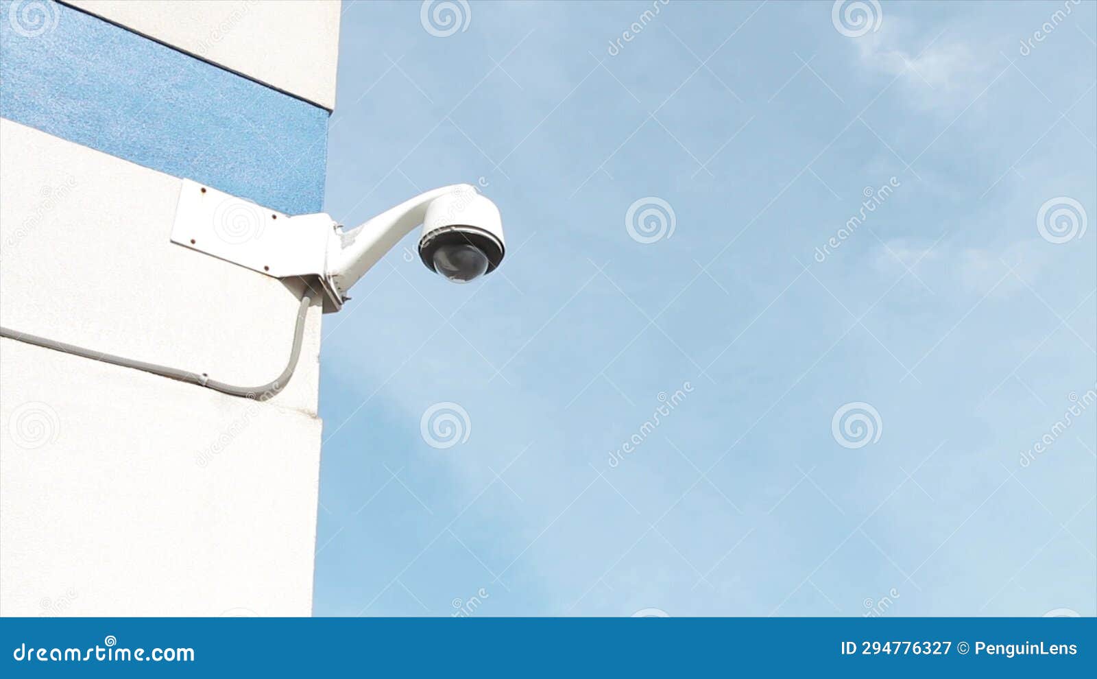 Round Wide Angle Security Camera Mounted on Corner of Building Wall in ...