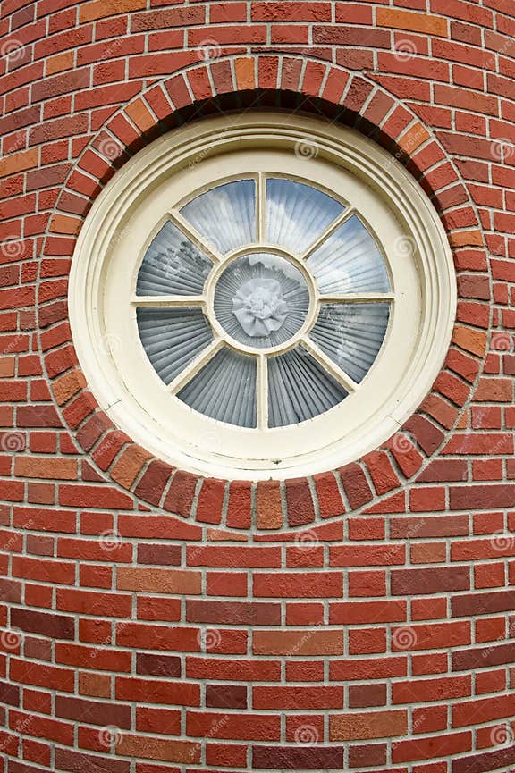 Round Window in a Brick Tower Stock Photo - Image of brick, design: 4995422