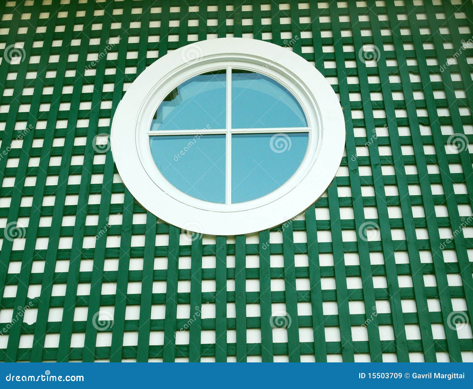 Round window on green stock image. Image of square, glass - 15503709