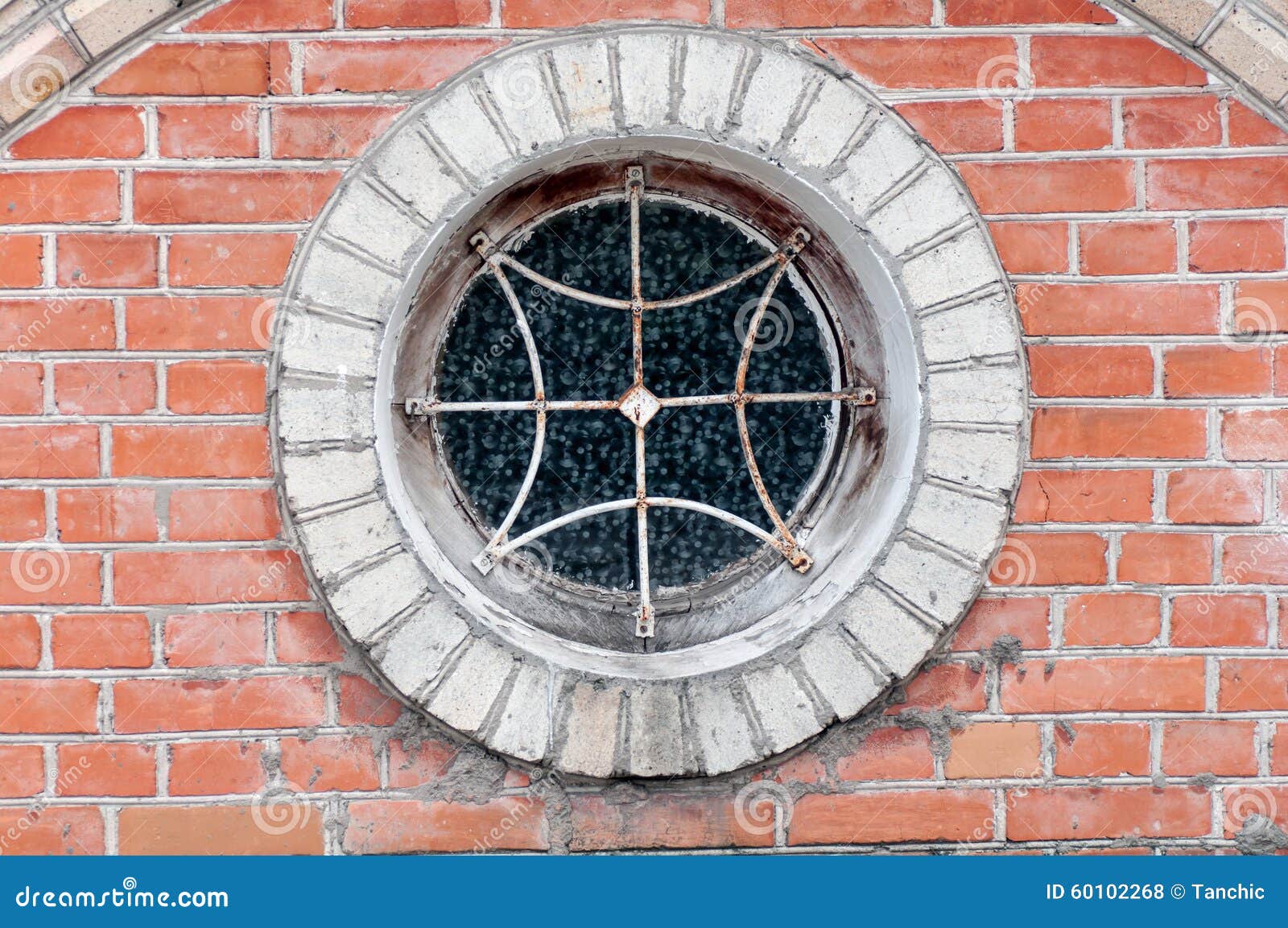 Round Window with Grille on the Brick Wall Stock Photo - Image of ...