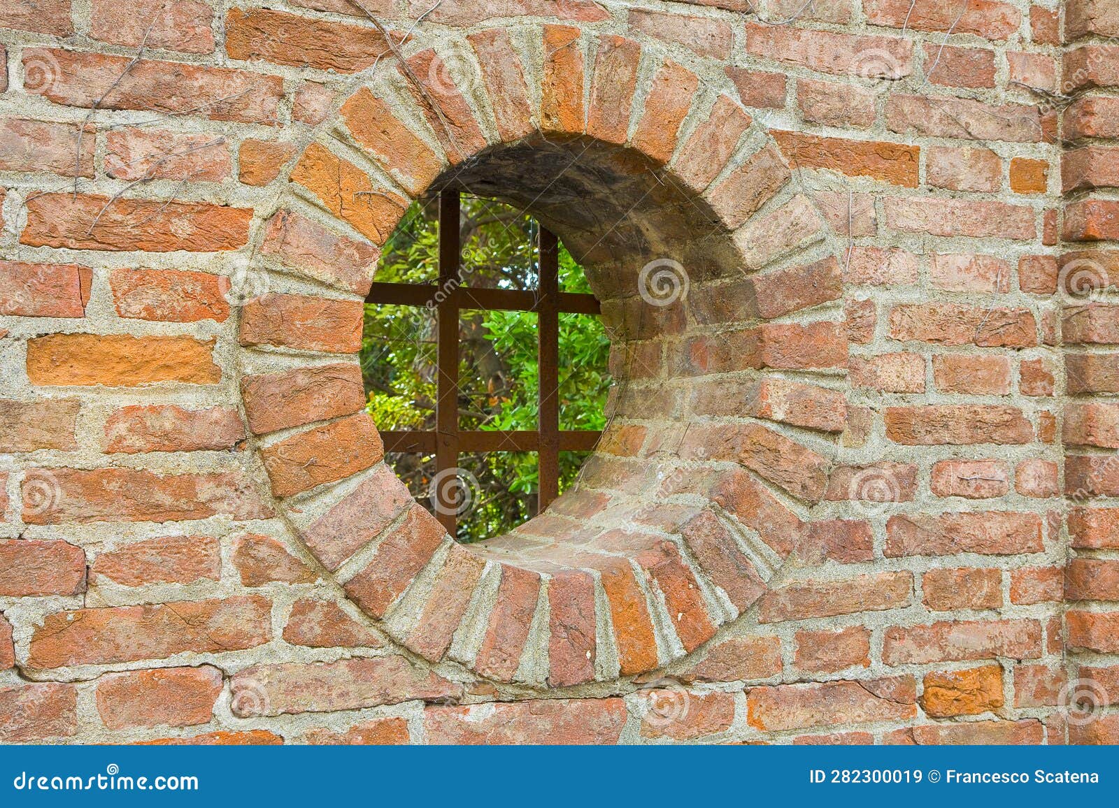 Round Window on Old and Weathered Brick Wall with Metal Grate Stock ...