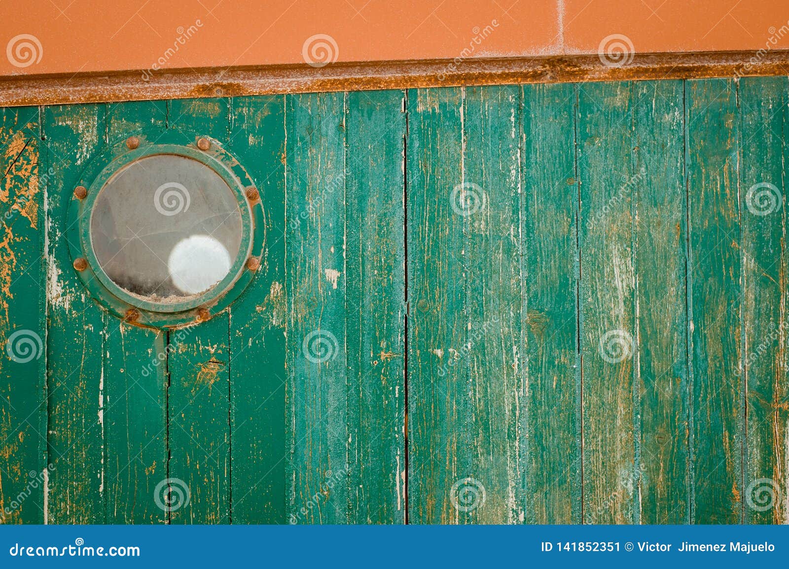 Round Window Over Green Distressed Wood Stock Image - Image of textured ...