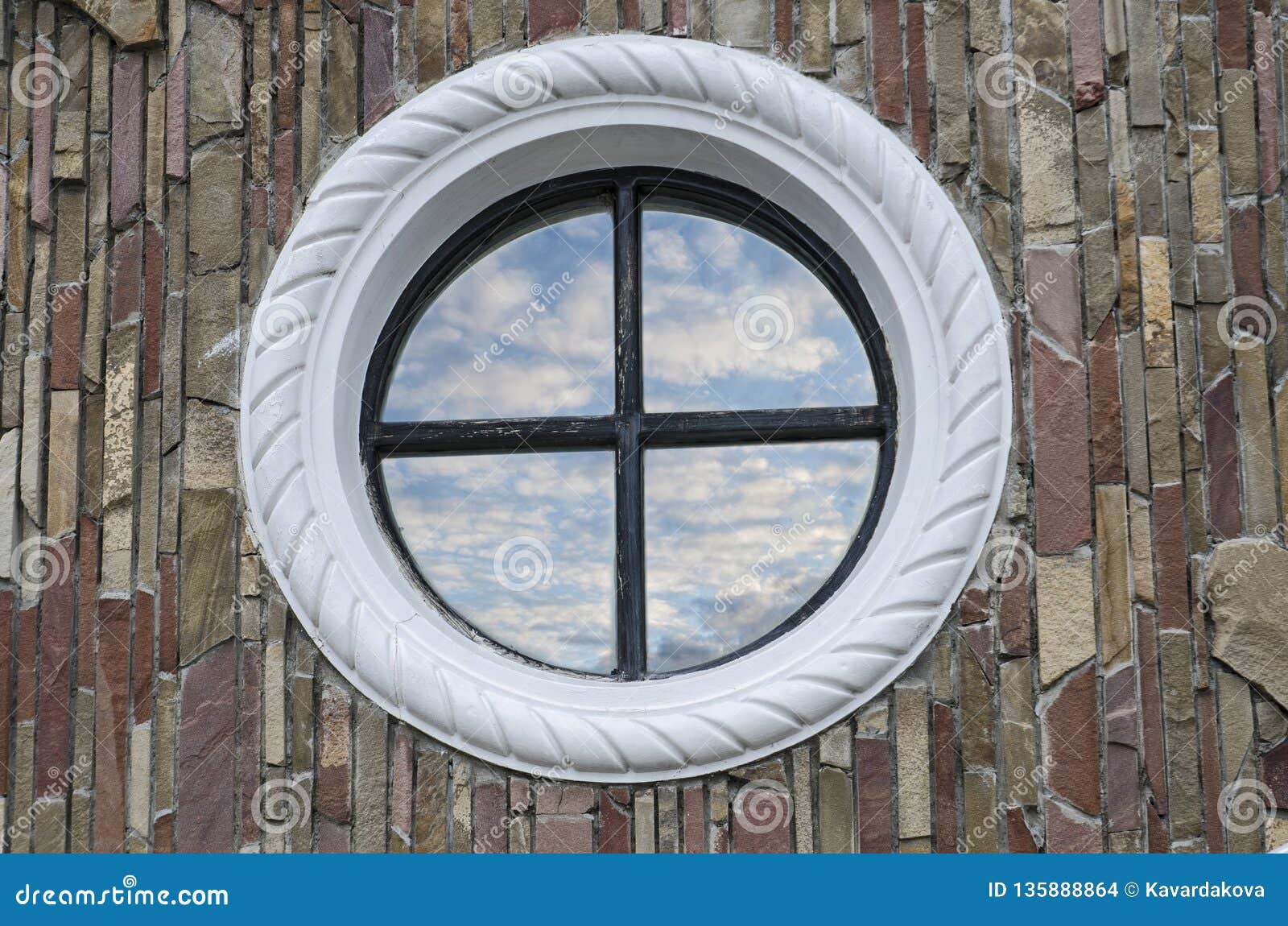 Round Window Reflects the Sky and Clouds Stock Photo - Image of wall ...