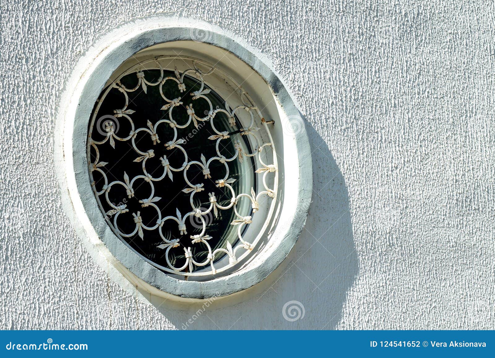 The Round Window With Wrought Iron Grating Stock Photo | CartoonDealer ...