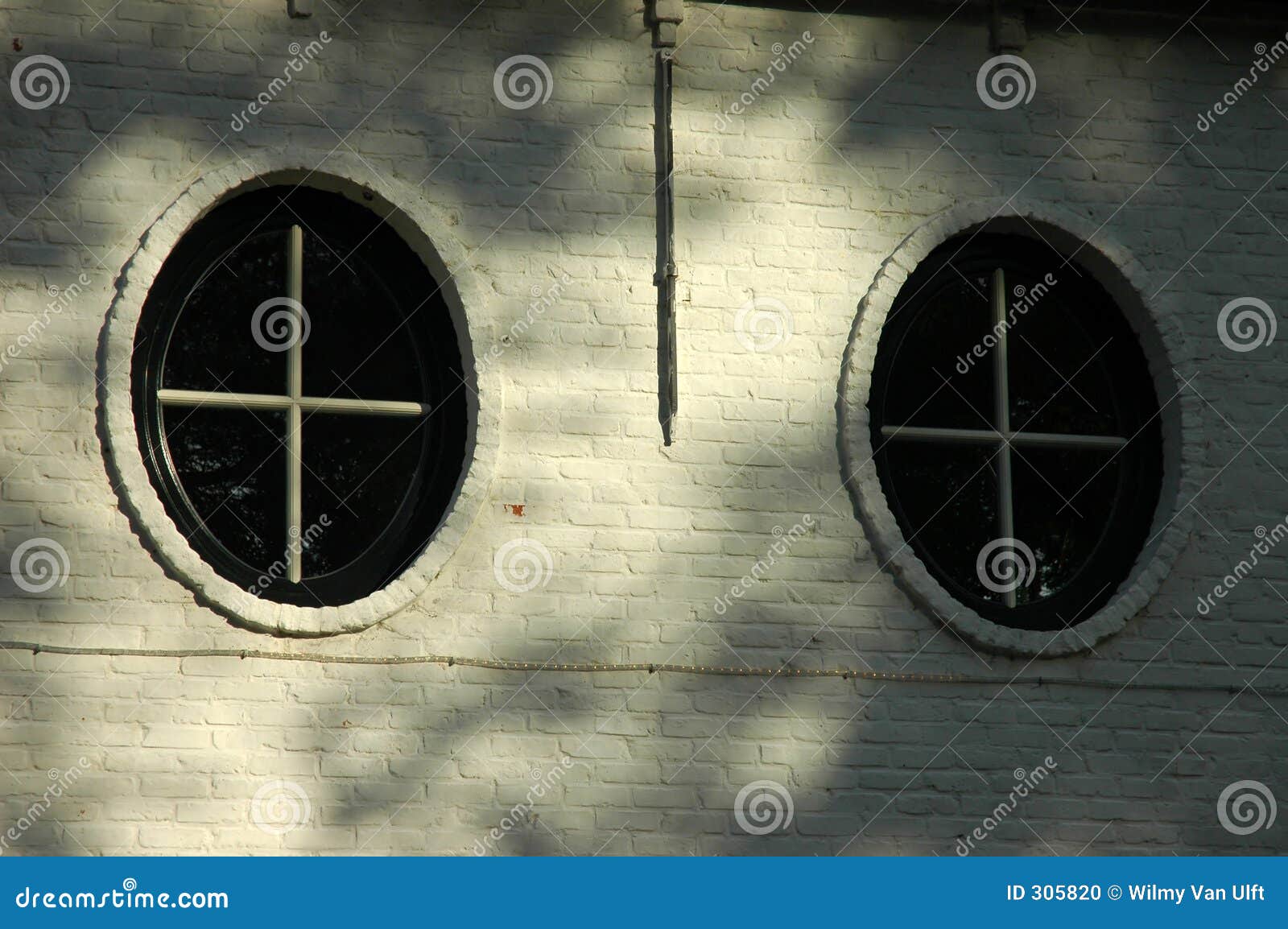 Round windows stock photo. Image of wall, windows, stone - 305820