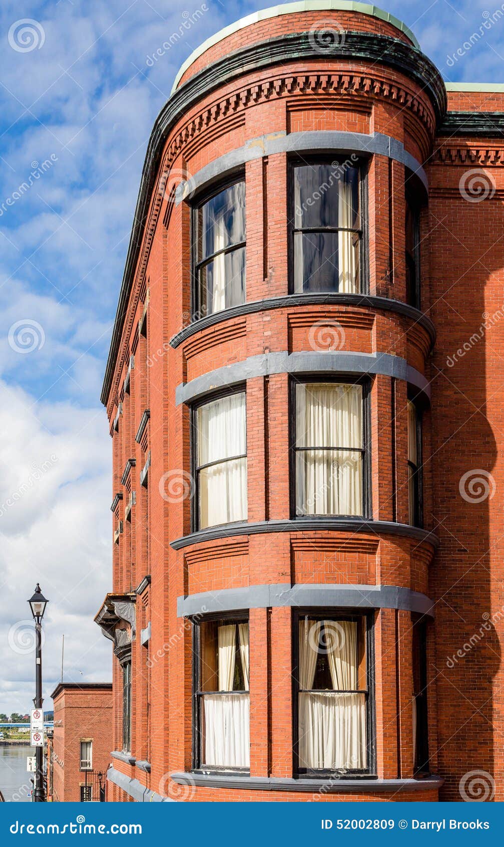 Round Windows in Old Brick Building Stock Image - Image of windows ...