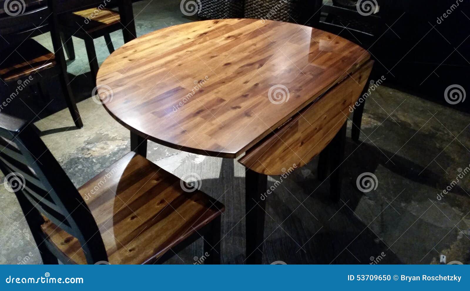 Round Wooden Table with Wood Details Stock Photo - Image of wood, side ...