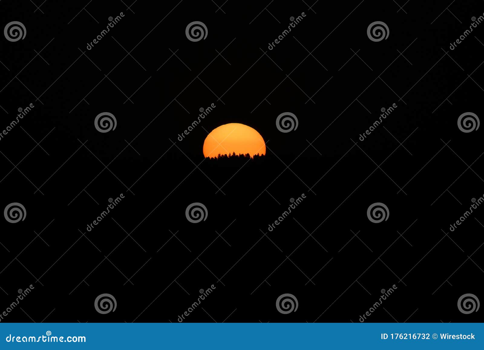 Round Yellow Light of the Sun on a Black Background Stock Photo - Image ...