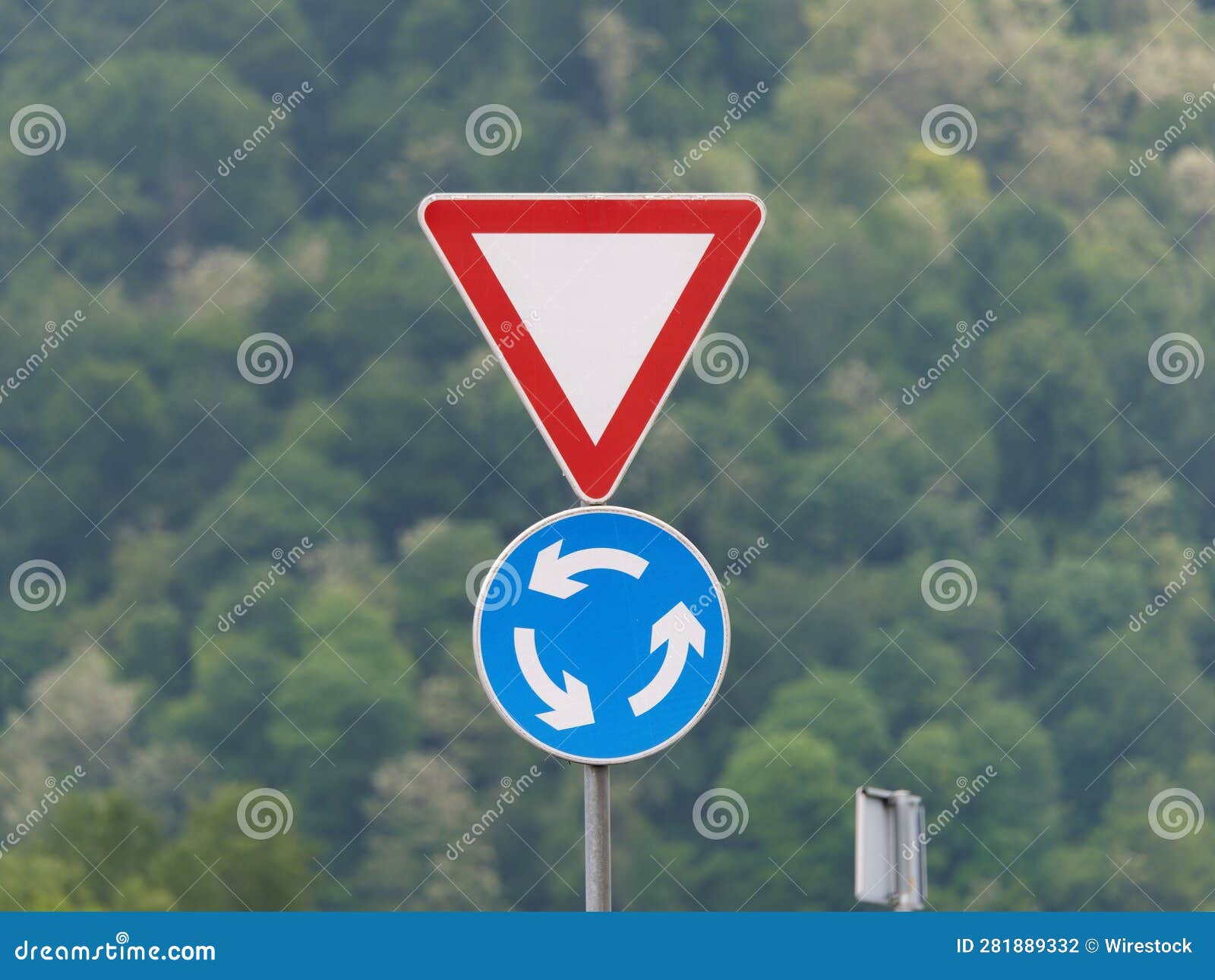 Roundabout Road Sign on the Highway Road Stock Photo - Image of grass ...