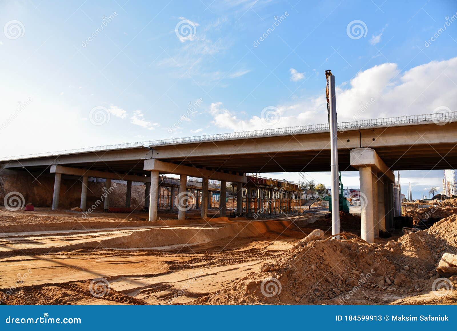 Roundabout and Traffic Bridge Construction. Construction Highway Ramps ...