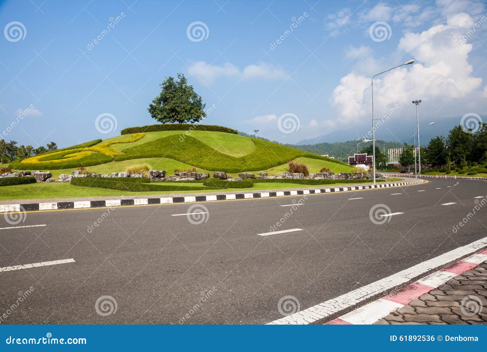 Roundabout whit tree stock photo. Image of rock, cloudy - 61892536