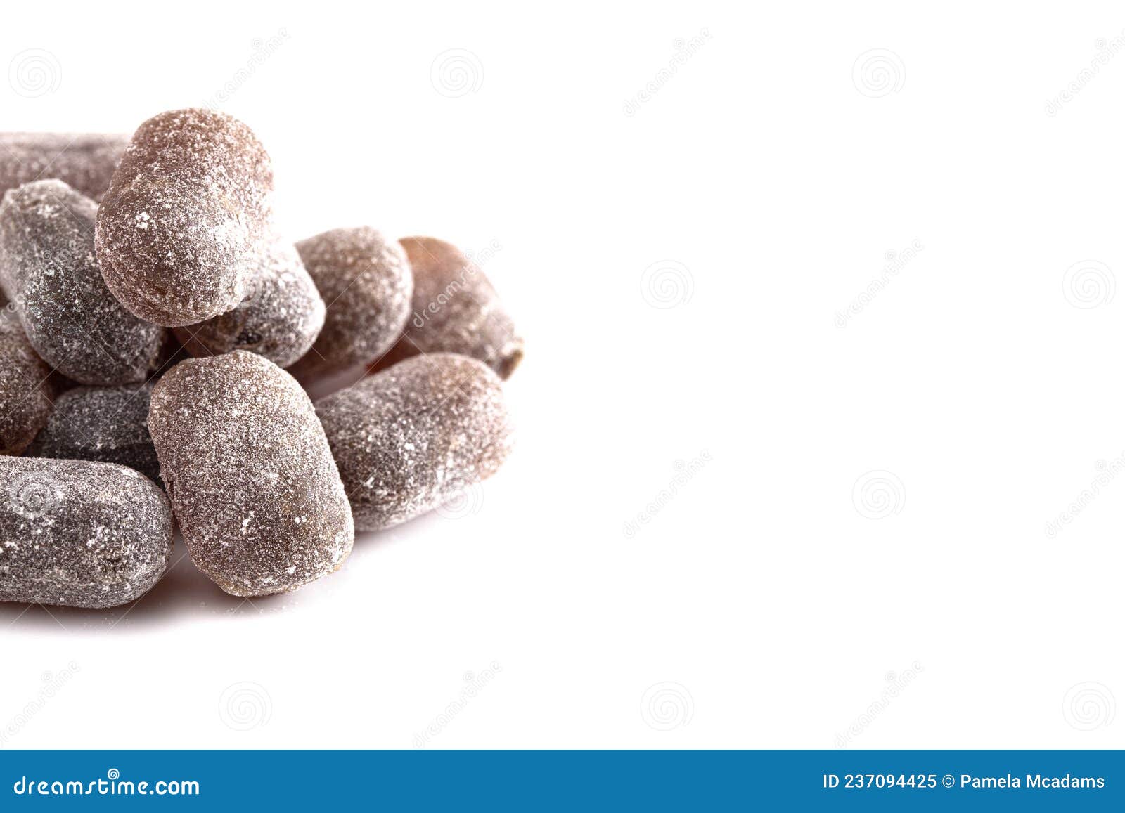 Rounded Brown Old Fashioned Hard Candies on a White Background Stock ...