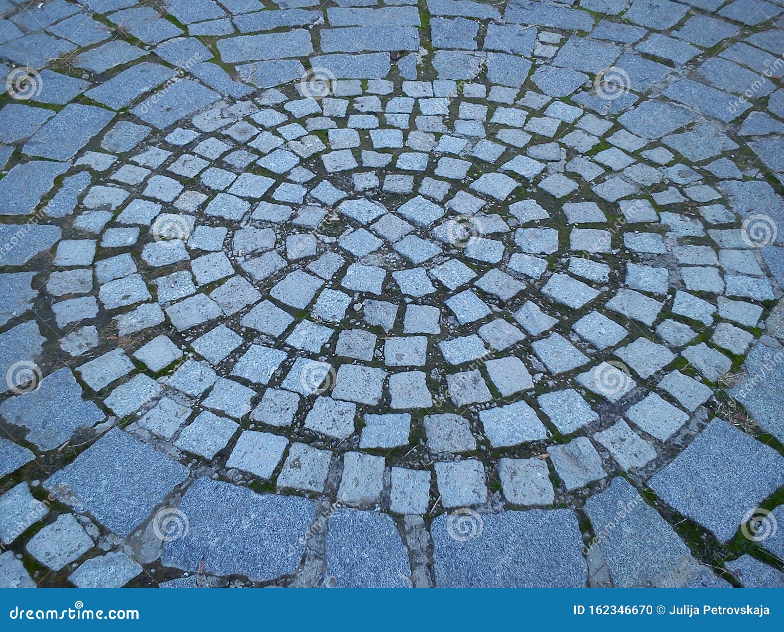 Rounded Cobblestone Mosaic. Cobblestone Paved with Stones in a Circle ...