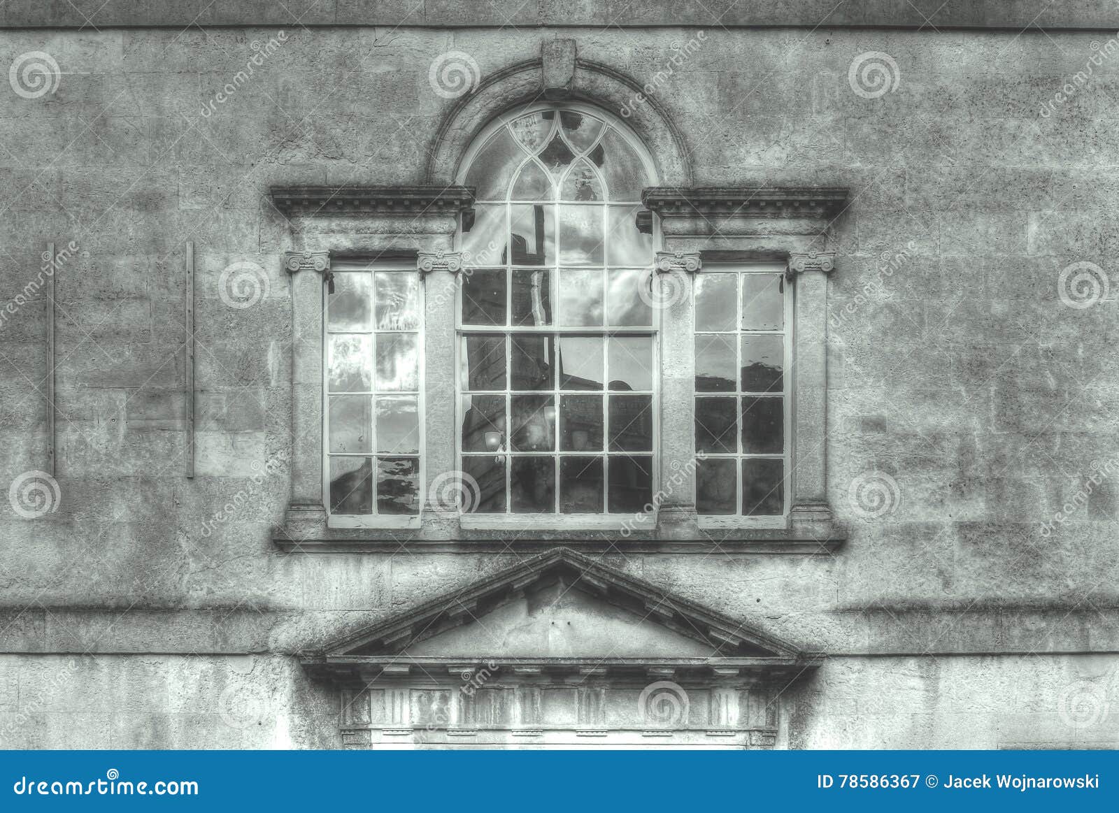 Rounded Decorative Sash Window between Small Windows Stock Image ...