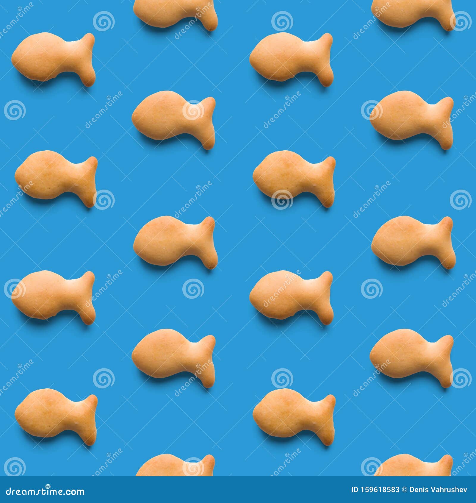 Rounded Fresh Crispy Fish Shaped Cookies on Light Blue Background ...