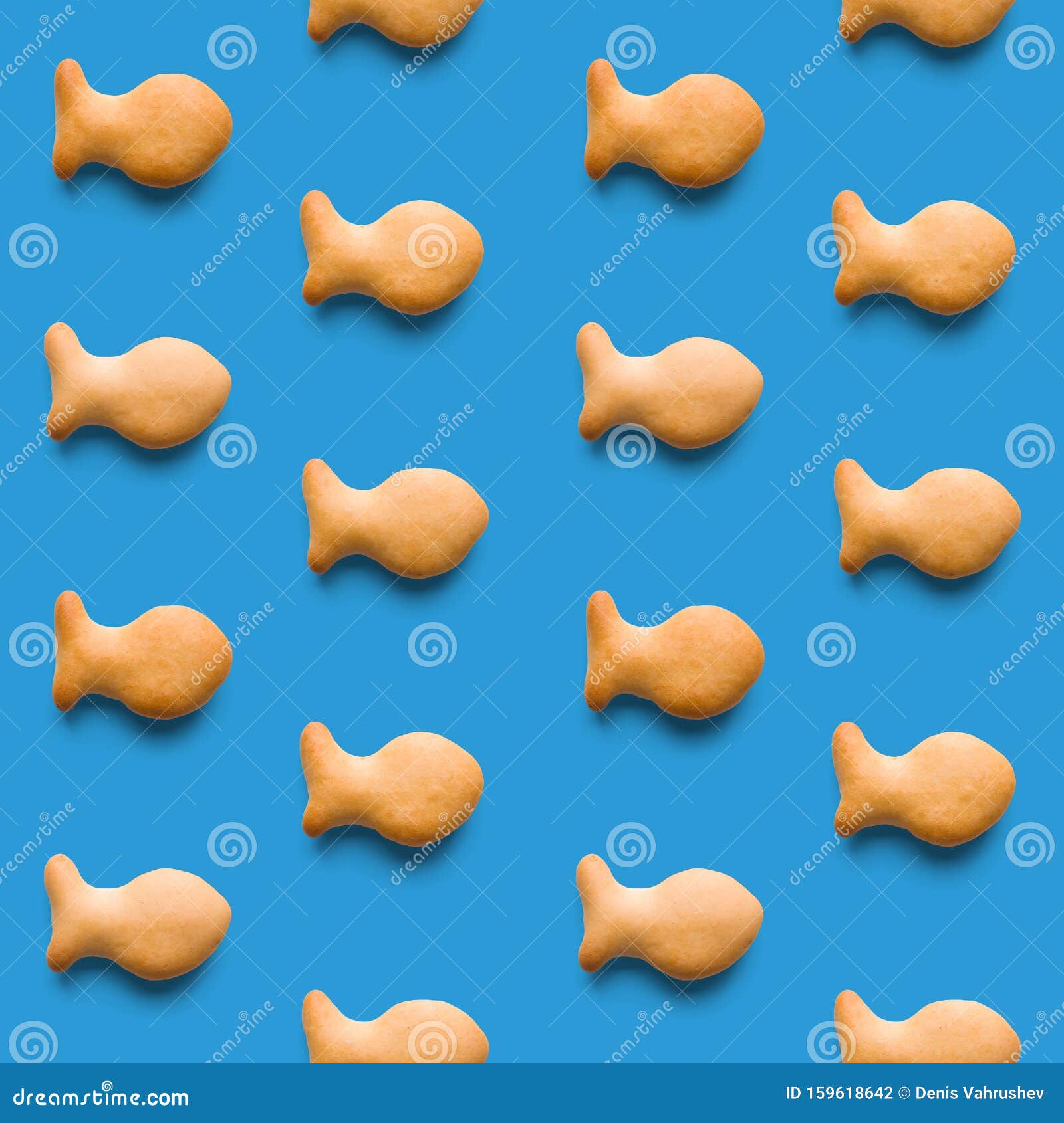 Rounded Fresh Crispy Fish Shaped Cookies on Light Blue Background ...