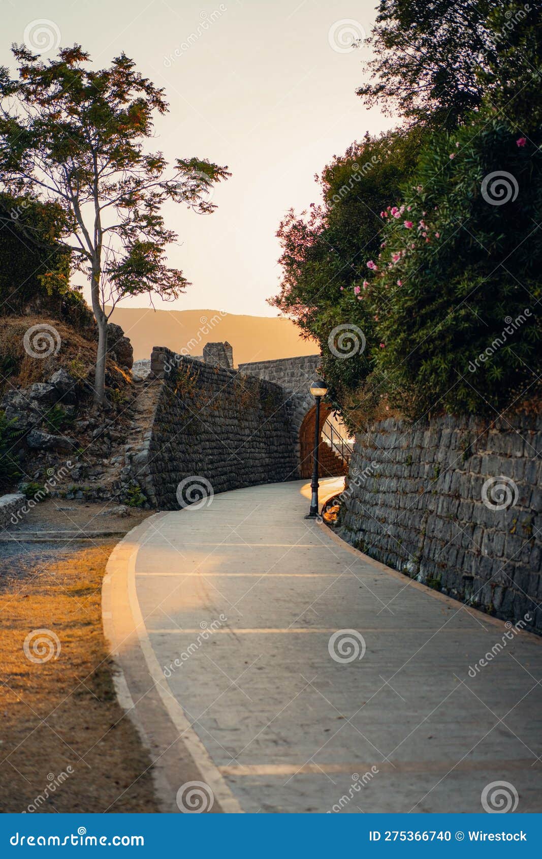Rounded Stone Path through a Stone Wall at Sunset in Herceg Novi ...