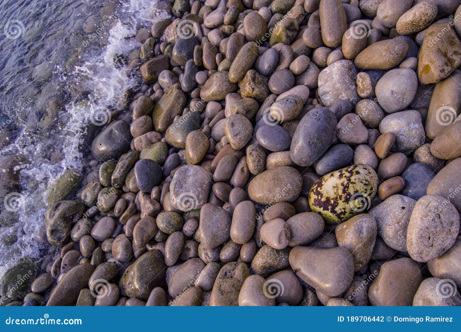 Rounded stones and beach stock photo. Image of pattern - 189706442
