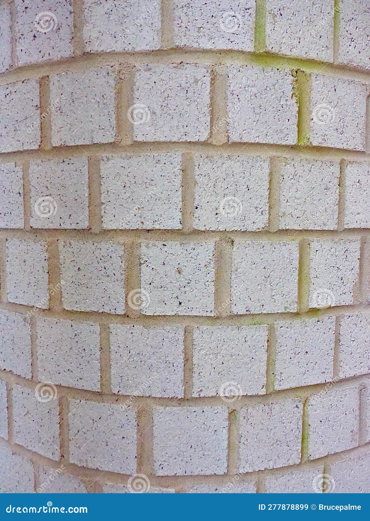 A Rounded Wall at the Edge of a Building Using Half Bricks Stock Image ...