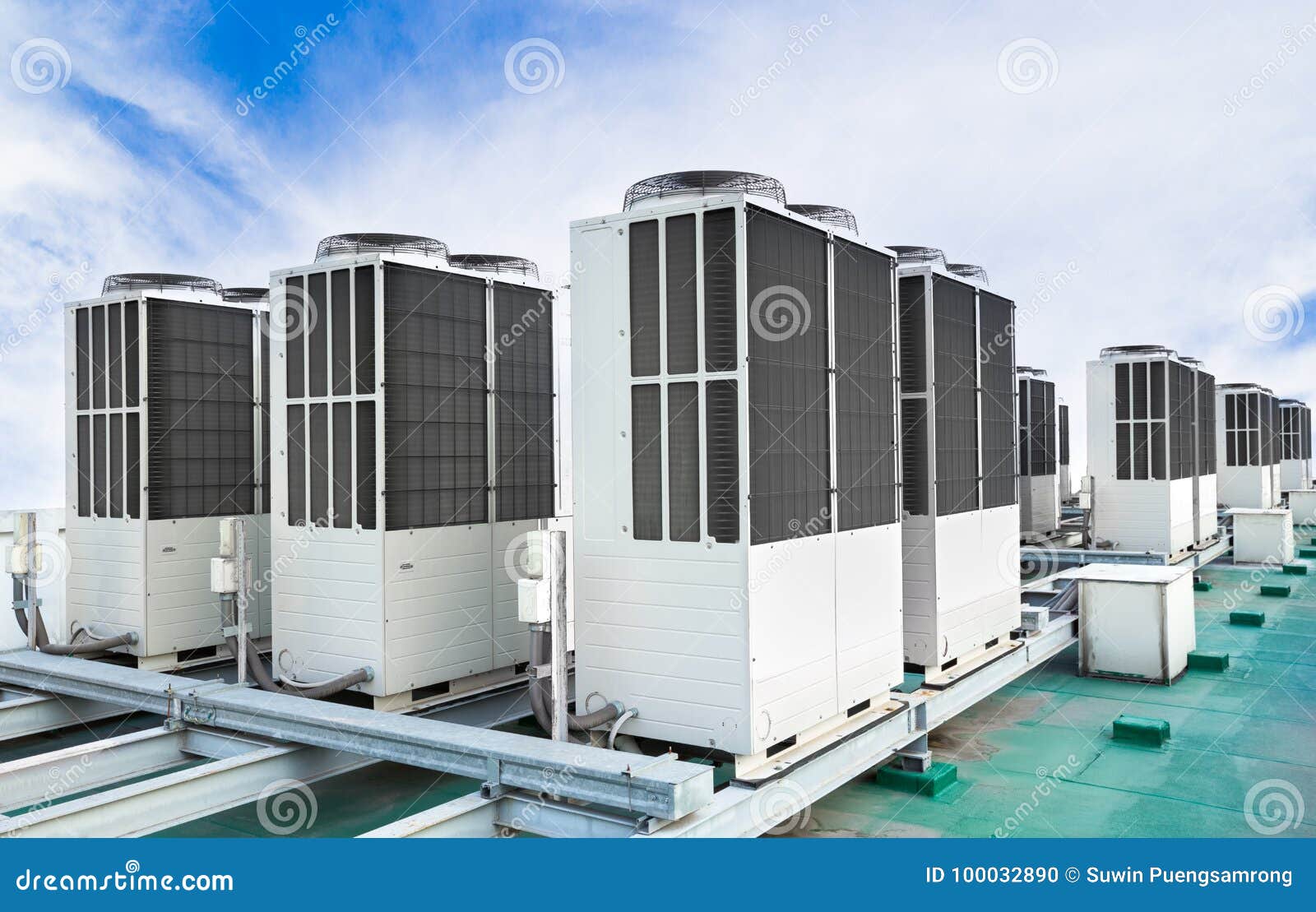 A Row of Air Conditioning Units on Rooftop with Blue Sky Stock Photo ...