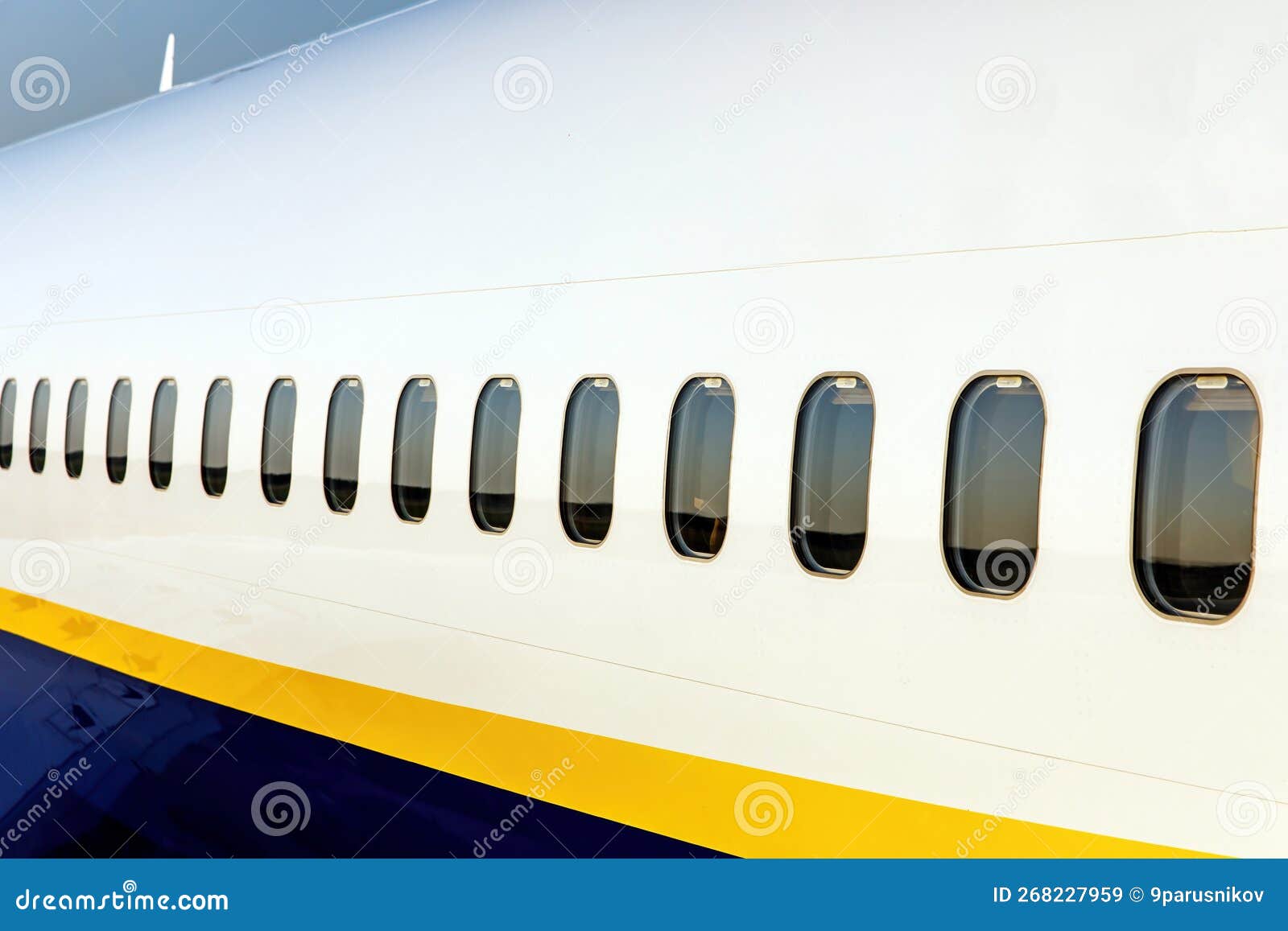 A Row of Airplane Windows, Portholes. Outside View. Stock Image - Image ...