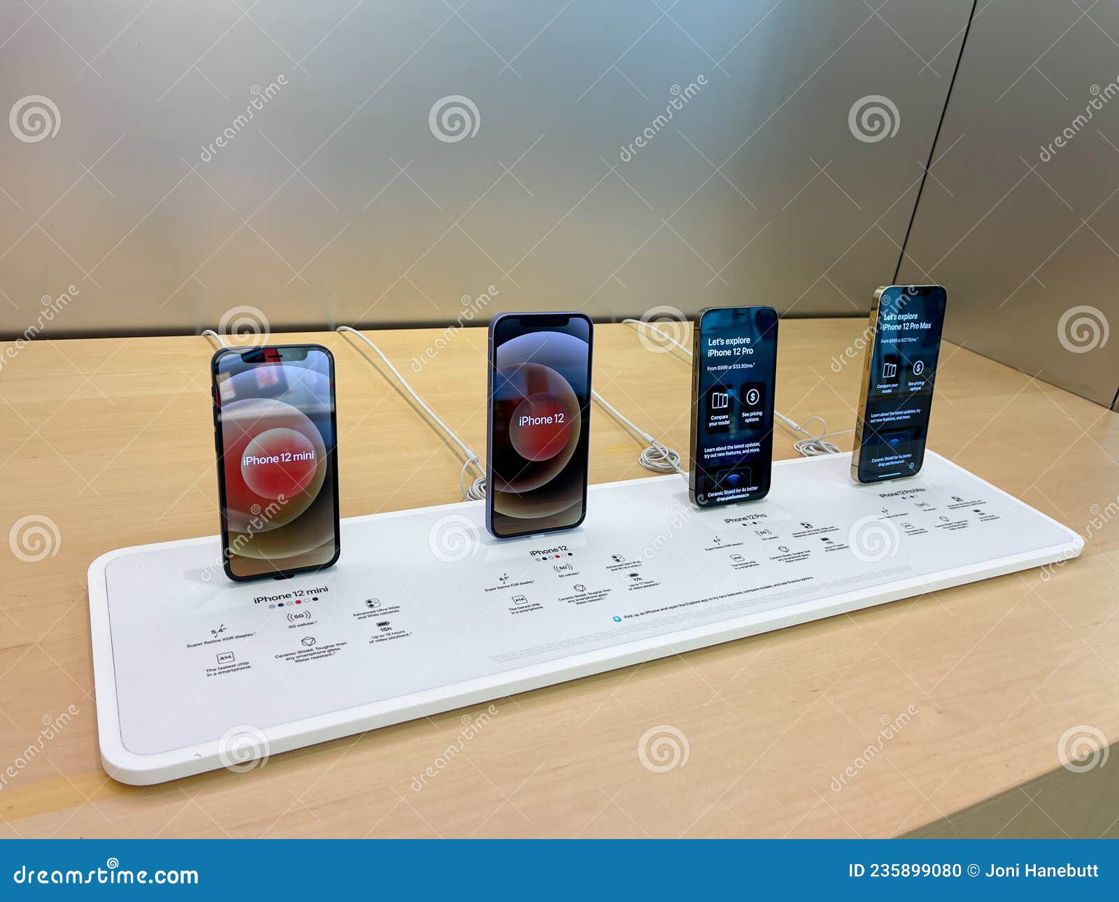 A Row of All of the Models of the IPhone 12 at an Apple Store Editorial ...