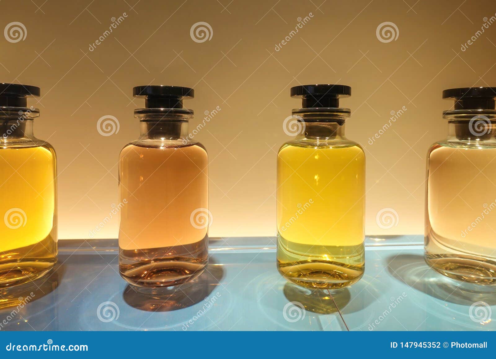Perfume bottle in showcase stock photo. Image of burberry - 147945352