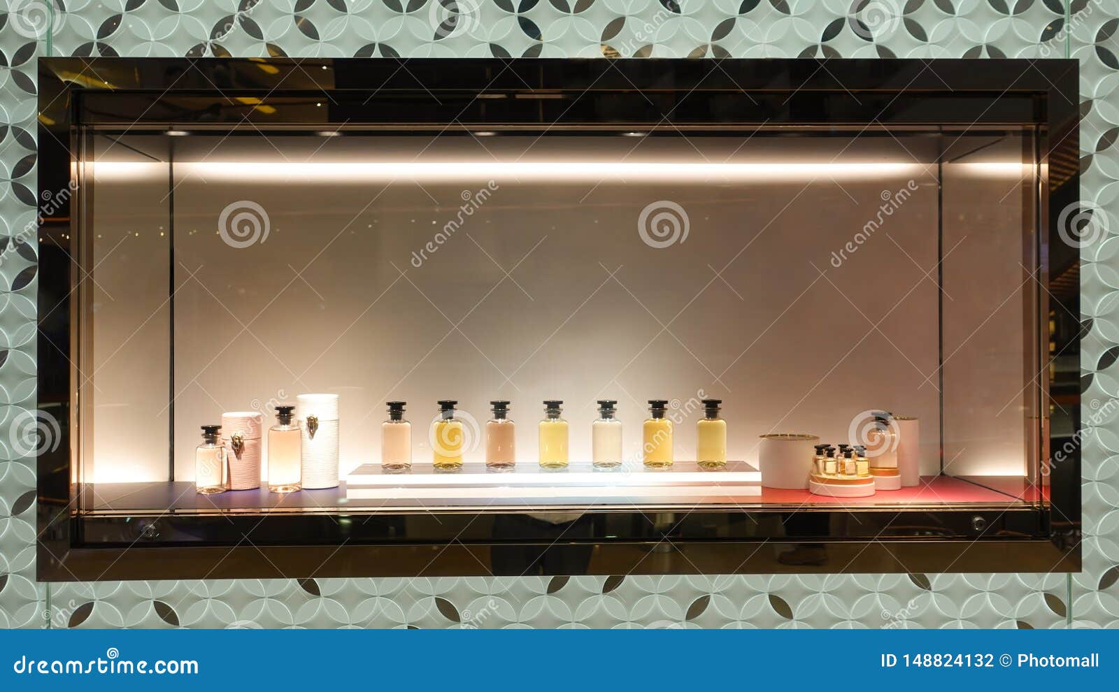 Perfume bottle in showcase stock photo. Image of liquor - 148824132