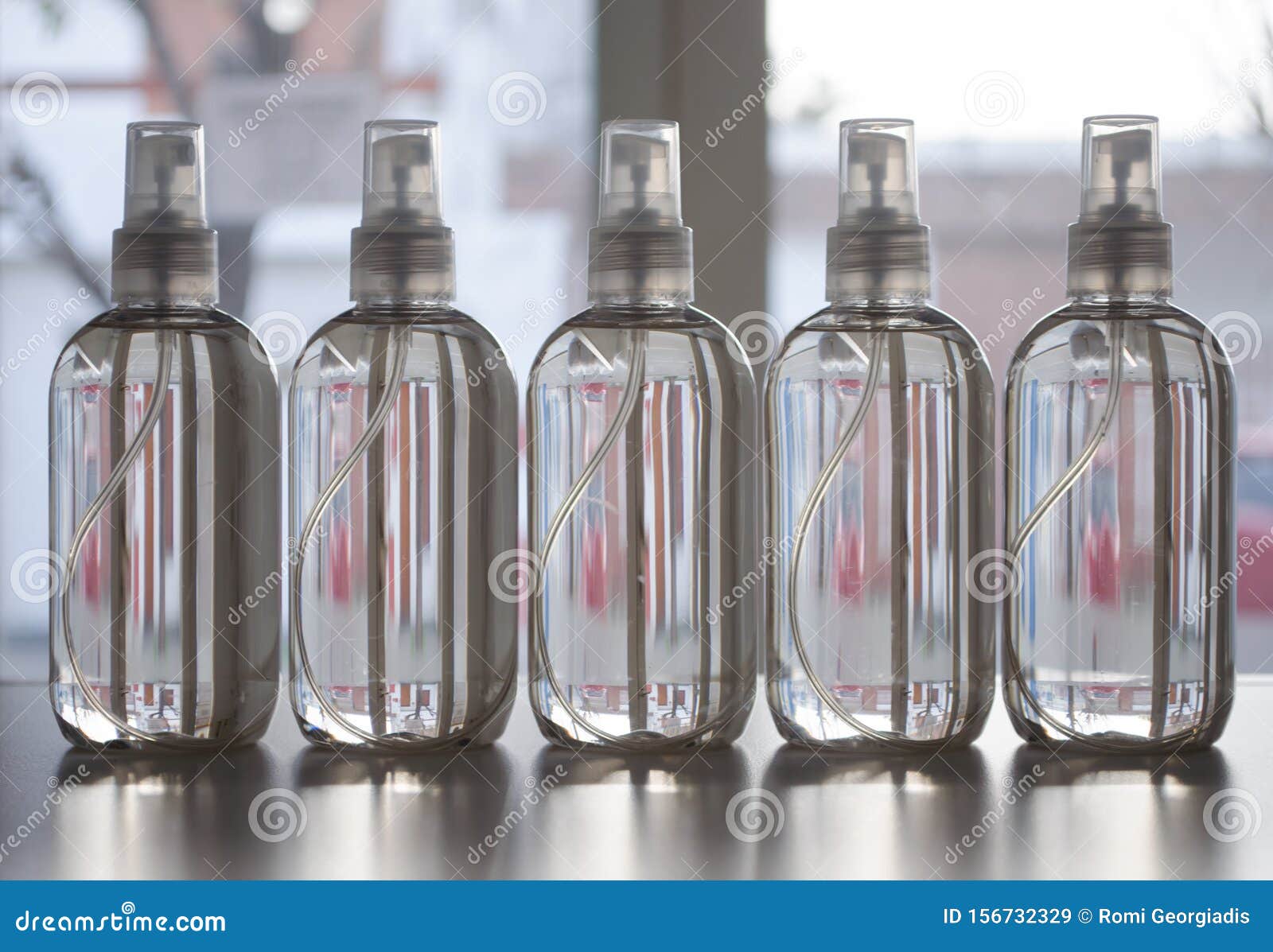 Row of Atomizer Plastic Bottles with Clothes Fragrance Stock Image ...