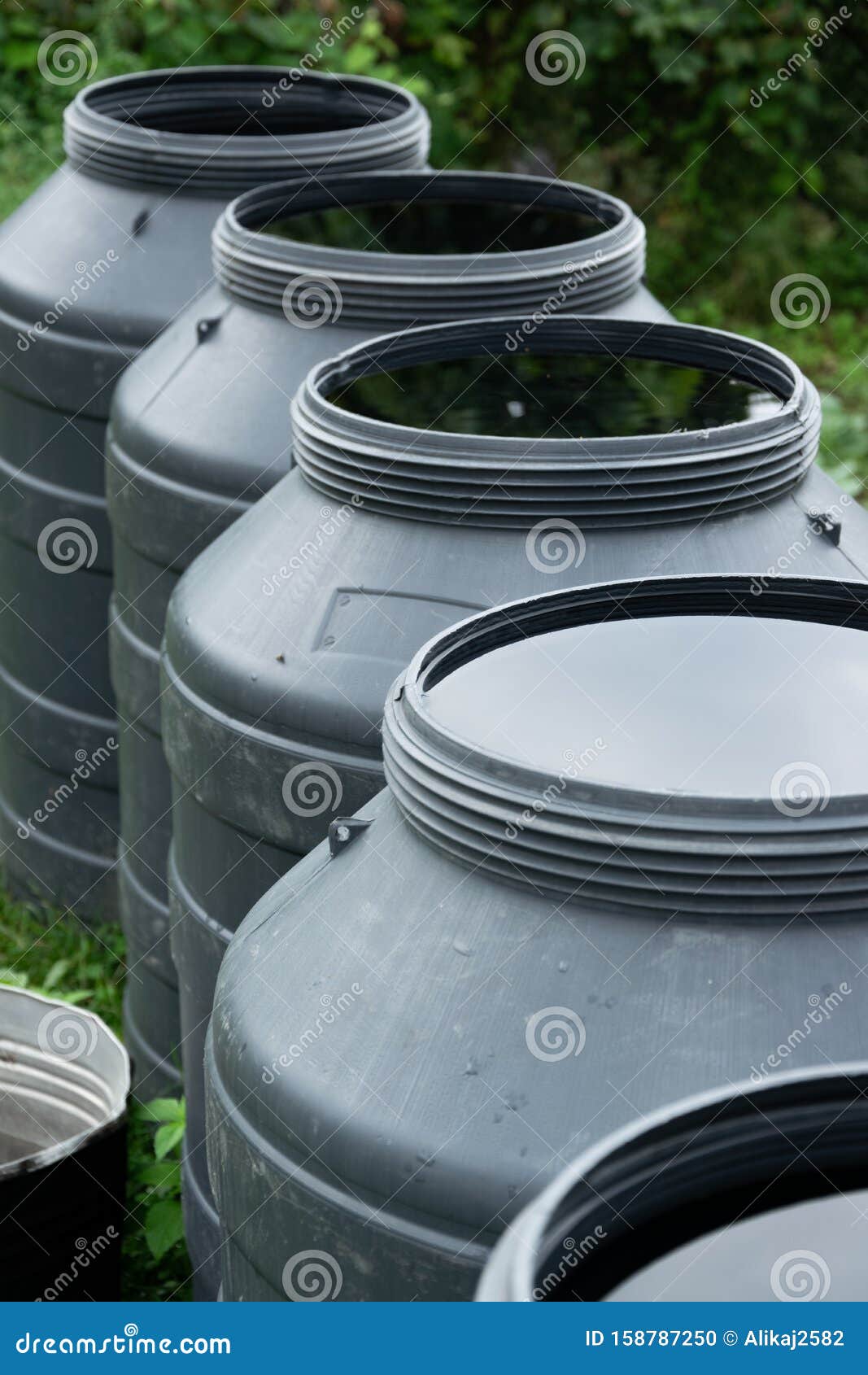 Row of Barrels with Liquids Stock Photo - Image of container, objects ...