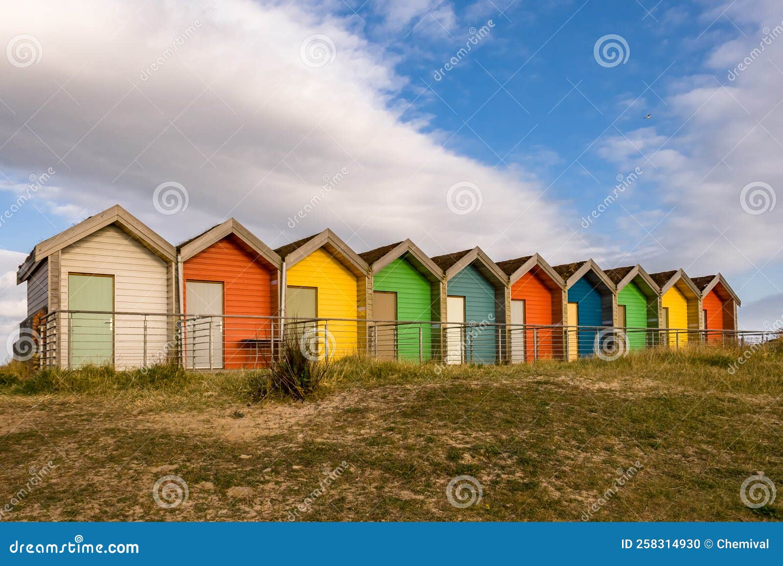 Row of Beach Huts in Blyth stock photo. Image of grass - 258314930