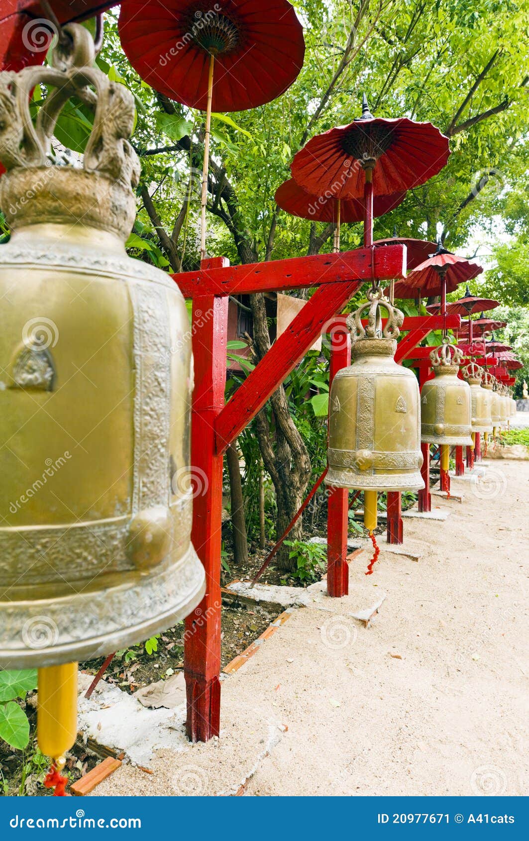 Row of Bells in a Temple Covered by Red Umbrella Stock Image - Image of ...