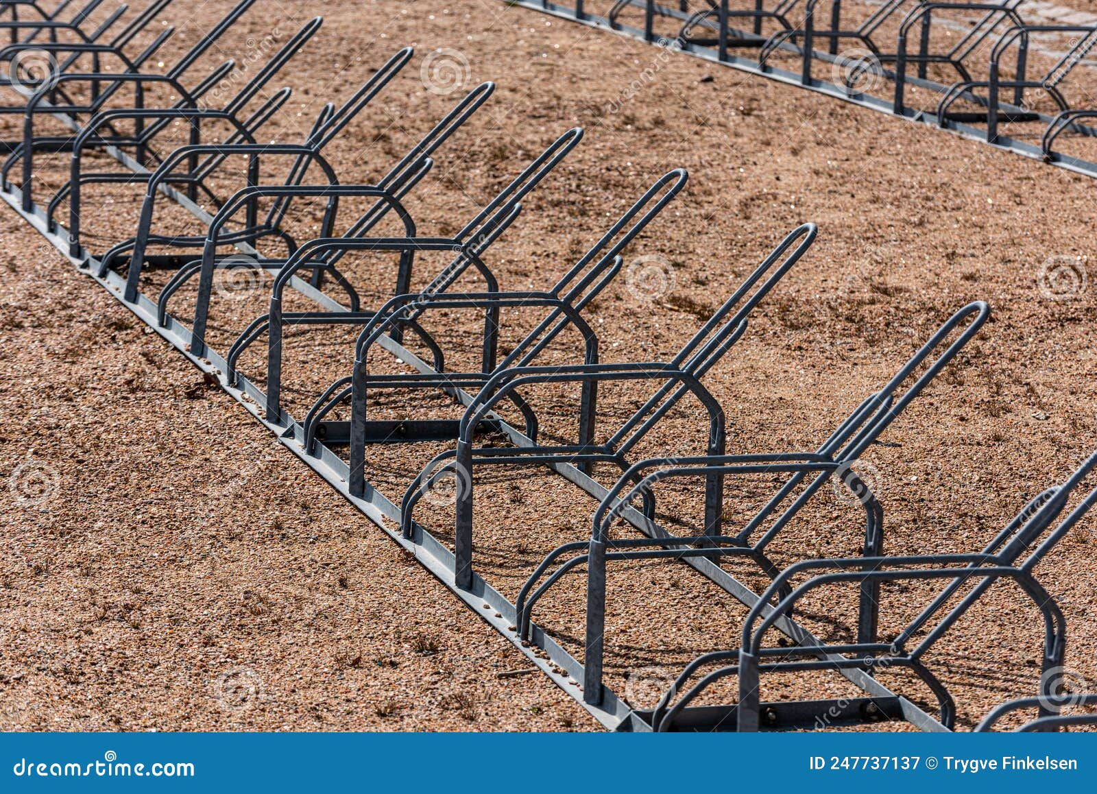 Row of Bicycle Racks on Gravel Ground.. Stock Image - Image of park ...