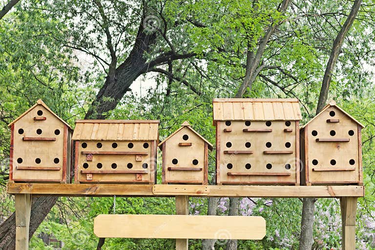 Row of birdhouses stock image. Image of bird, construction - 14233627
