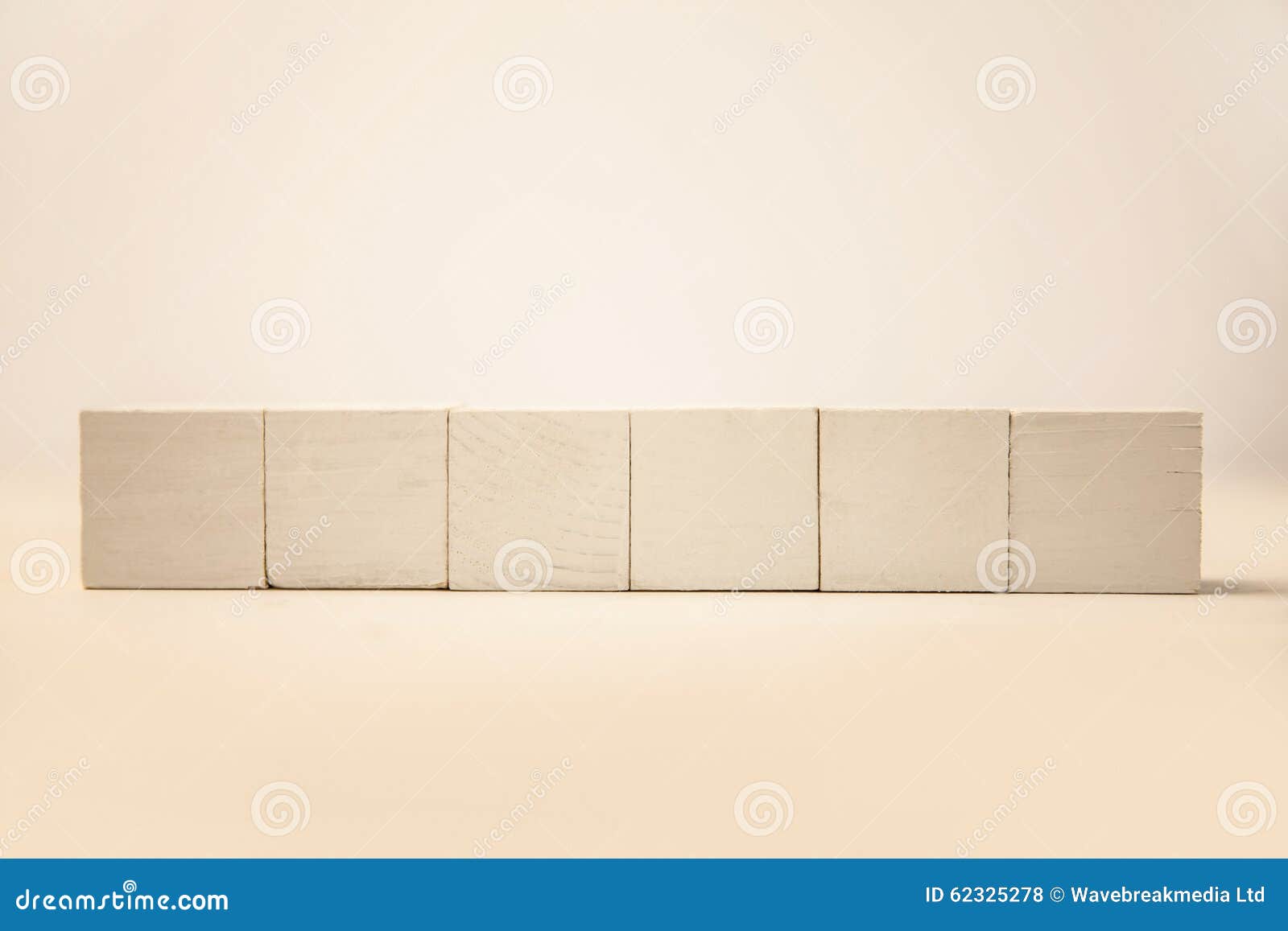 Row of blocks on table stock photo. Image of order, surface - 62325278