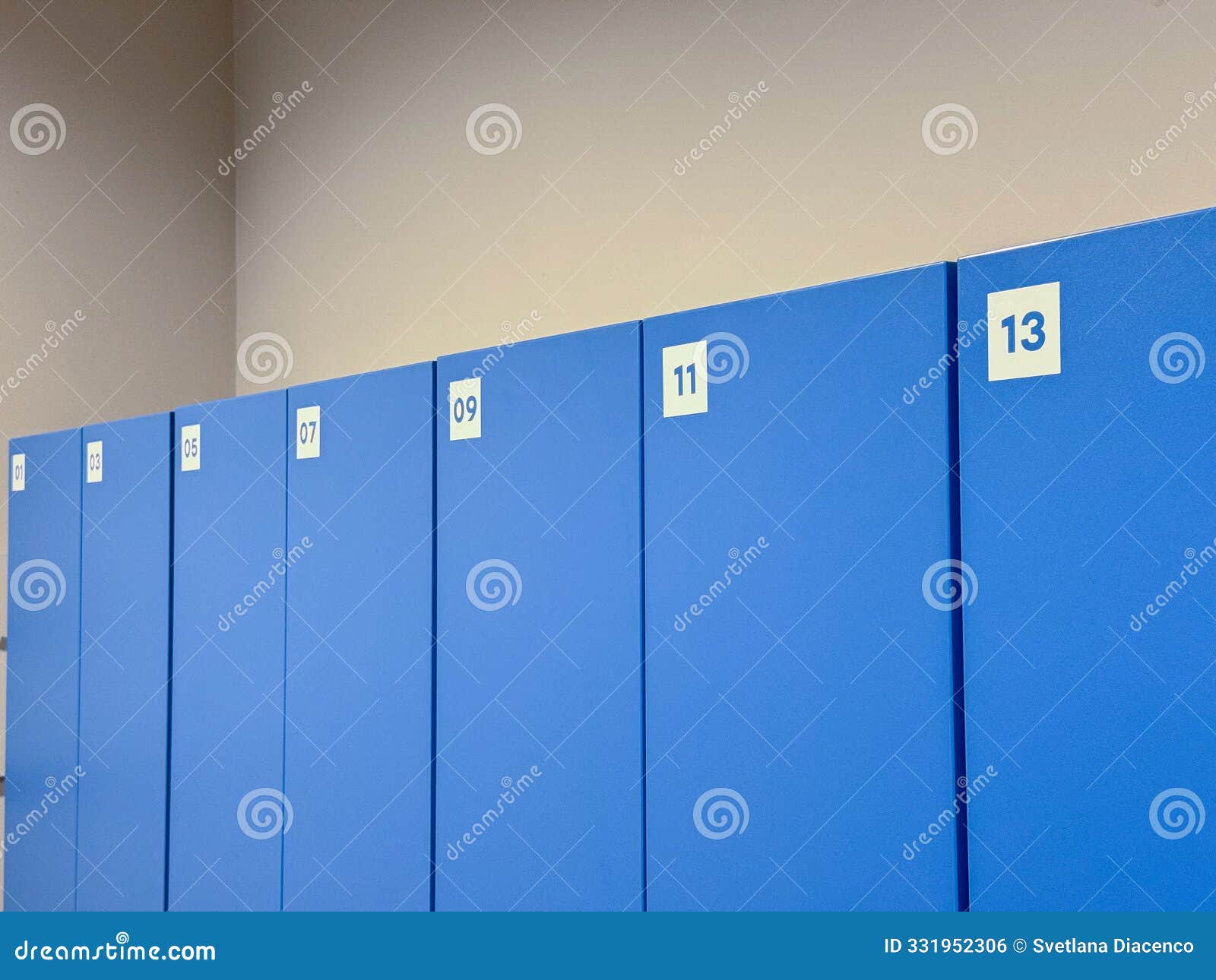 A Row of Blue Lockers Numbered 1 through 13 in a Clean and Organized ...