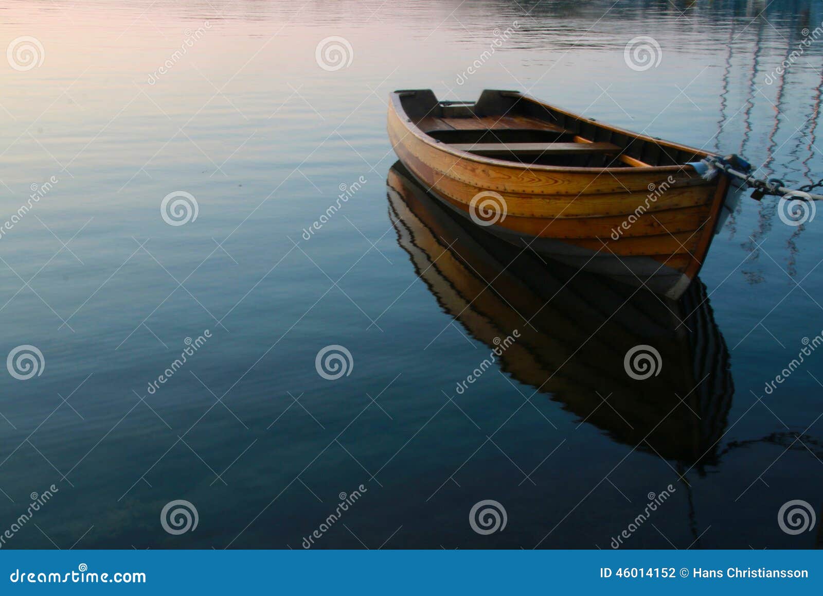 Row boat in calm water stock photo. Image of floating - 46014152