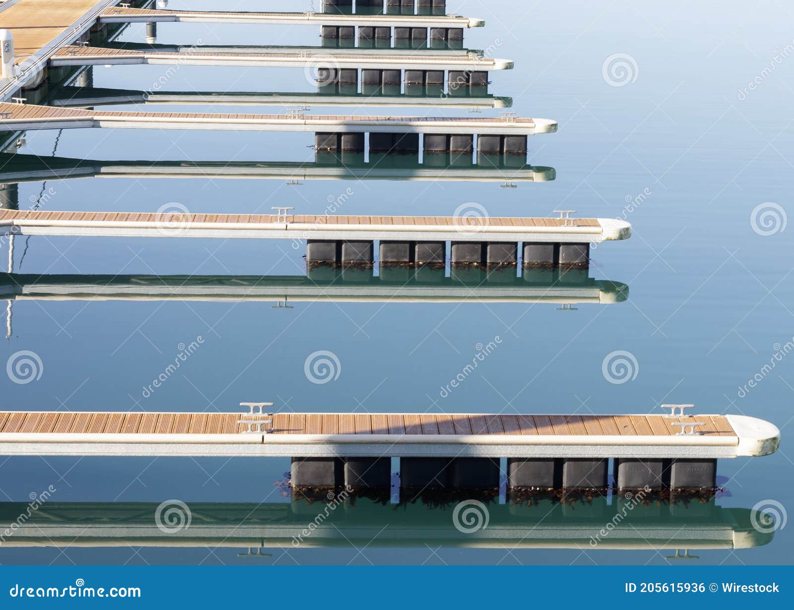 Row of a Boat Dock with Its Reflection on the Water Stock Photo - Image ...